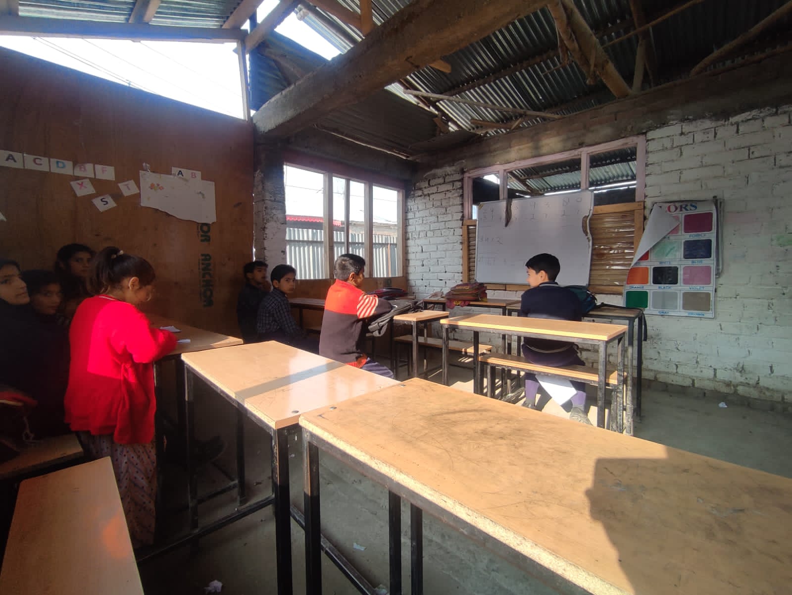 Govt School Sopore students forced to study under open sky; official ...